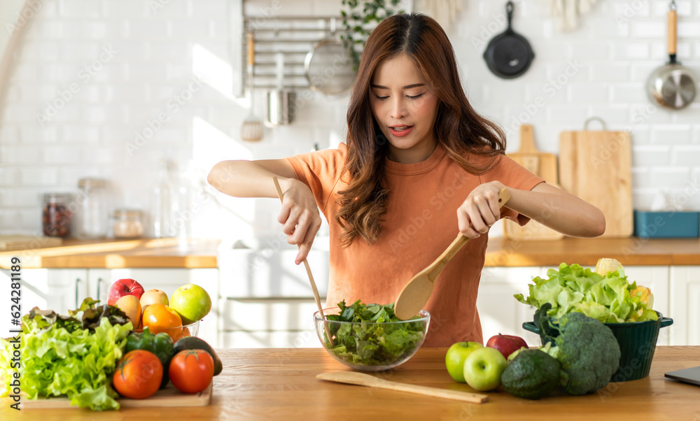 Portrait of beauty body slim healthy asian woman having fun cooking and ...