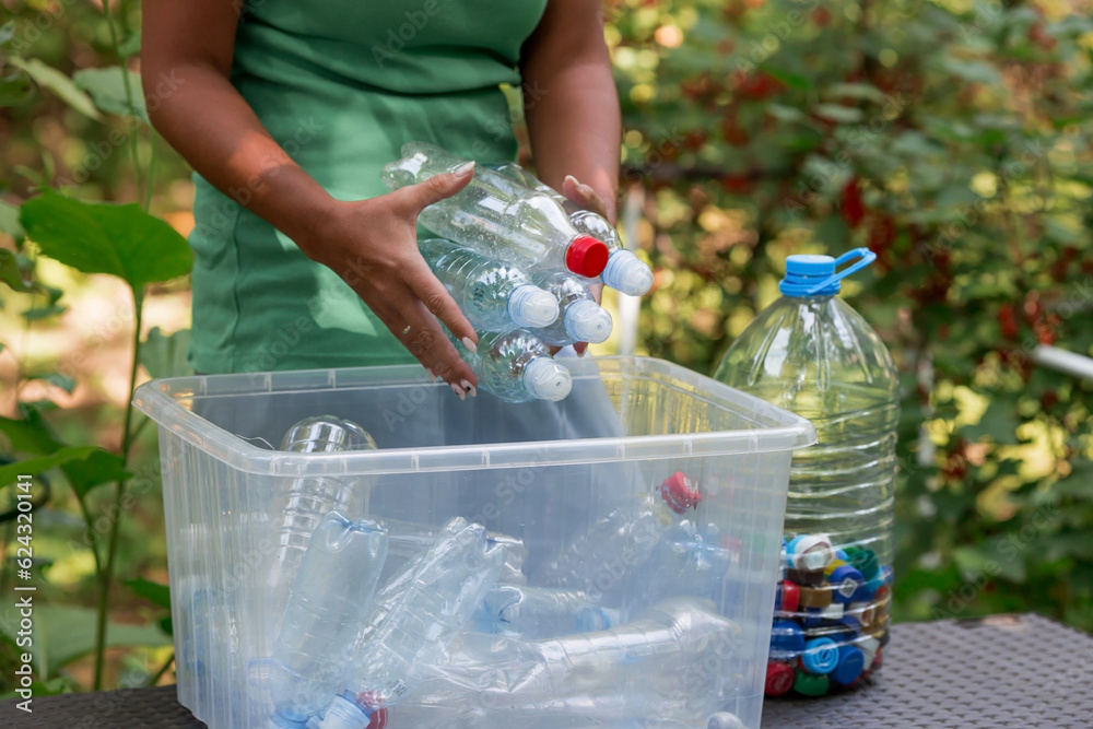 Container of plastic bottles. Garbage collection around the world ...