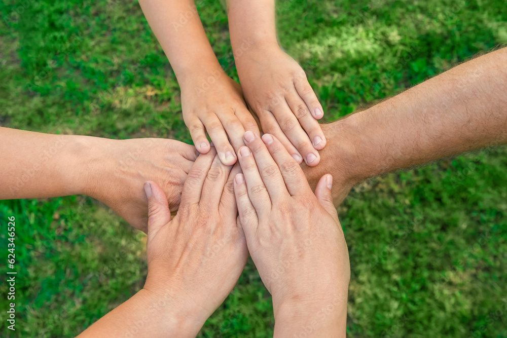 Joined hands as a team. Business teamwork. Close up group of ... Joined hands as a team. Business teamwork. Close up group of ...