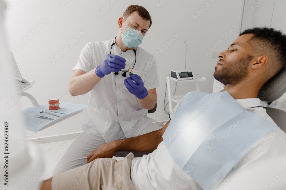 Closeup to the dental clinic patient and doctor have a conversation the ...