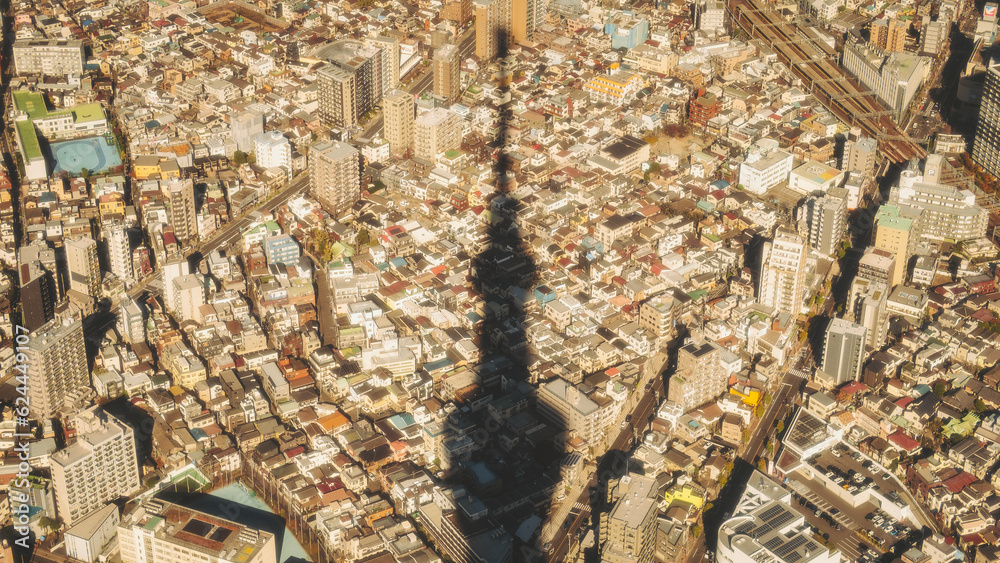 View of the shadow of the Tokyo Skytree Tower over the urban area of ...