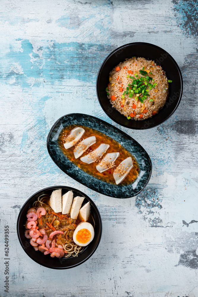 Rice with chicken, dashi broth and calamari in sweet and sour plum ...