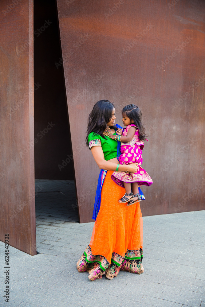 beautiful indian family mom mother with daughter girl hugging and ...