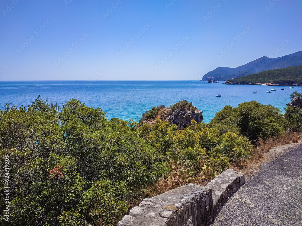 Road and vegetation and mountain of Serra da Arrábida Natural Park with ...