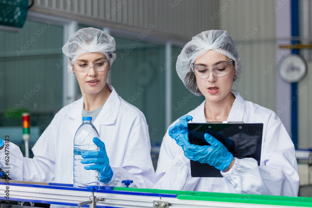Team factory worker sterile uniform manufacture drink water. Female ...