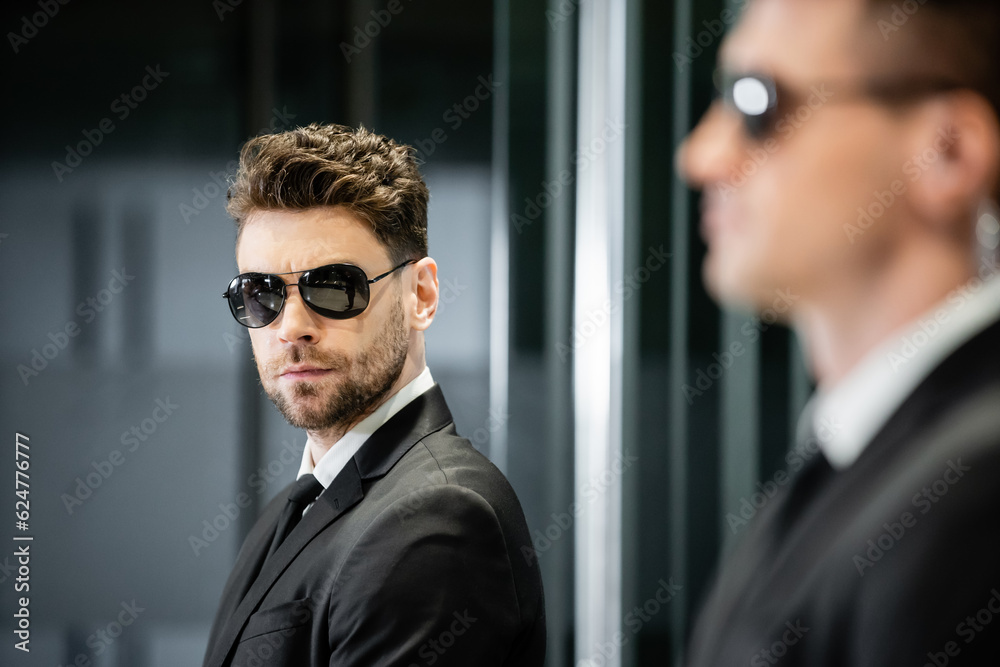 bodyguard service, private security, handsome man in suit and ...