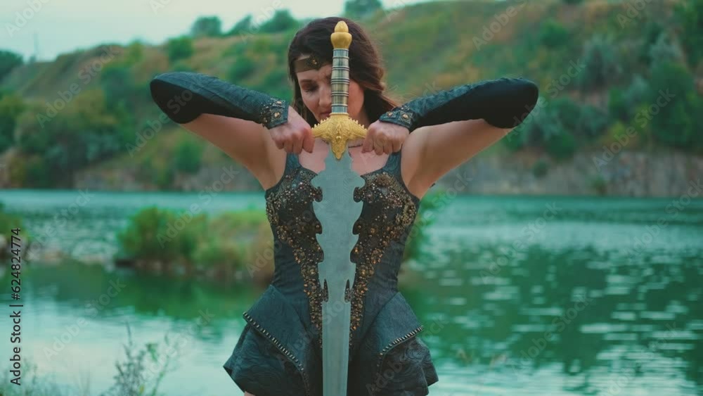 Fantasy woman viking princess warrior holding weapon sword. Warlike ...