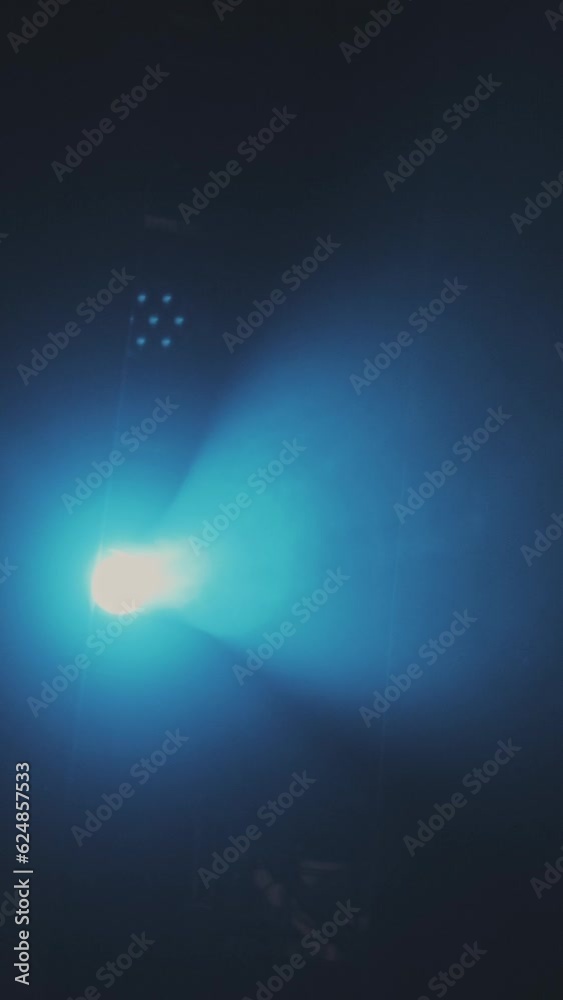 Scene illumination with a profiled blue beam of a profile spotlight in ...