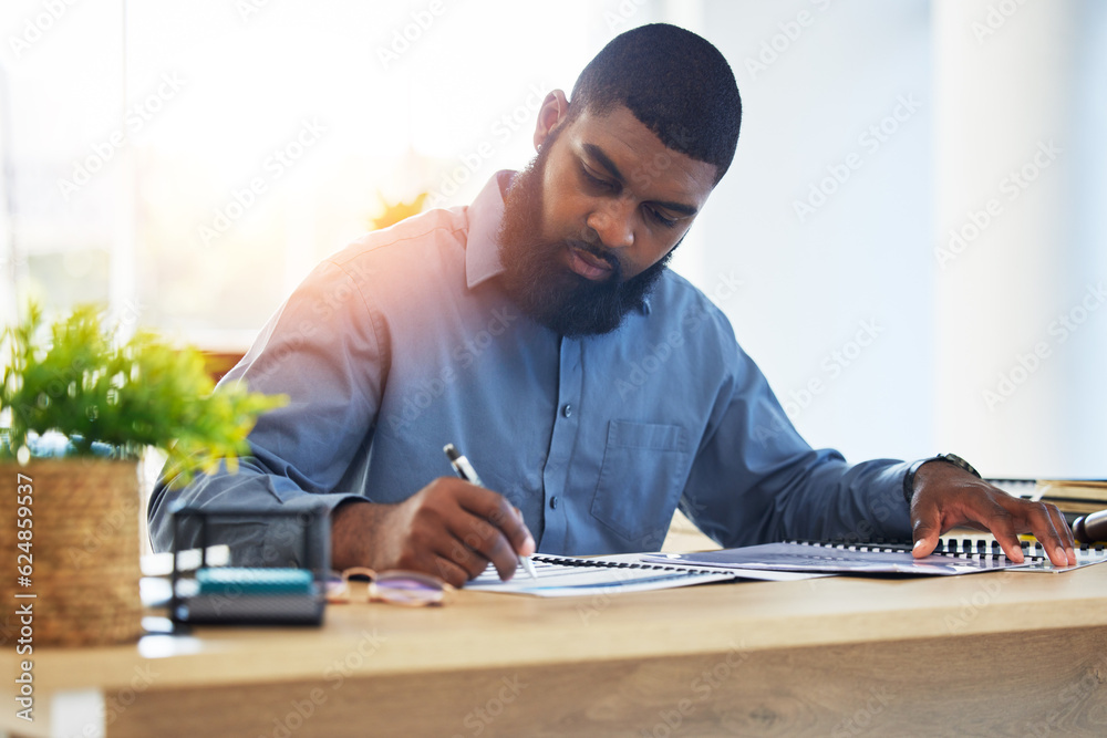 Business, planning and black man writing, brainstorming and schedule ...
