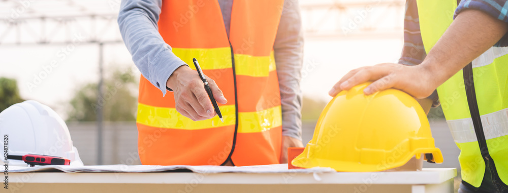 Builder team, hand of two asian young engineer, architect man, male ...