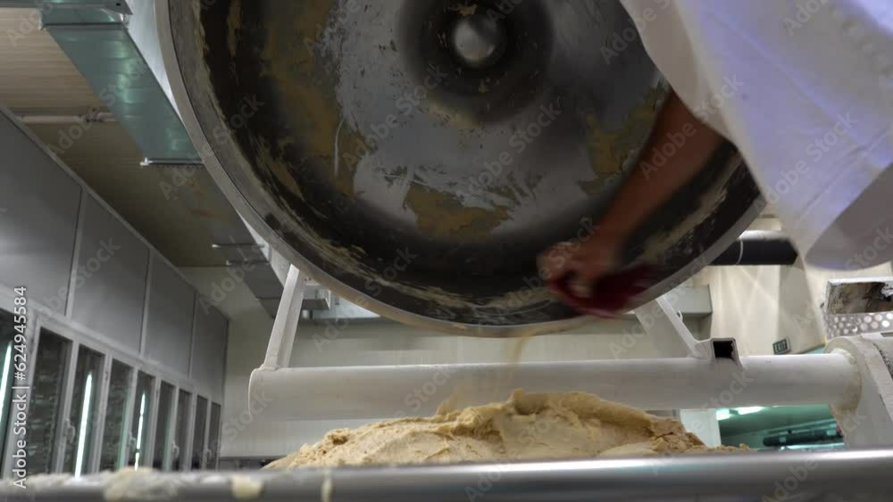 Dough Being Transferred from the Dough Kneading Machine at Bread ...