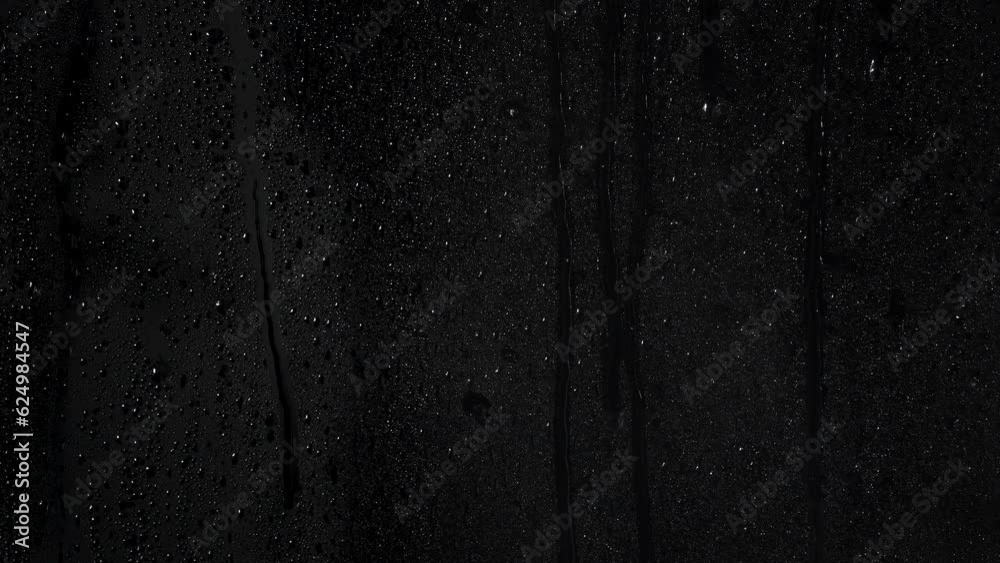 Water drops running on a wet window with light mist Stock 비디오 | Adobe Stock