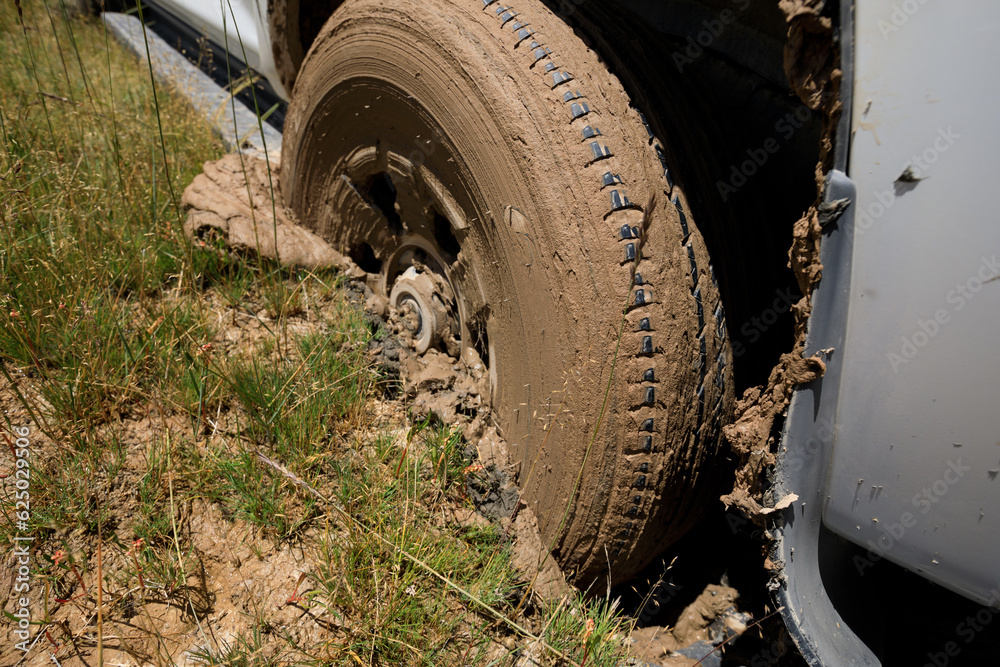 Offroad car got stuck in the mud Stock Photo | Adobe Stock