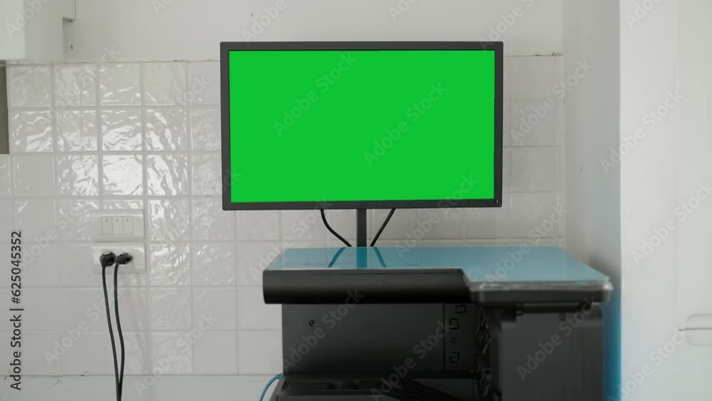 Chroma key green screen display smart copier or printer machine on work ...