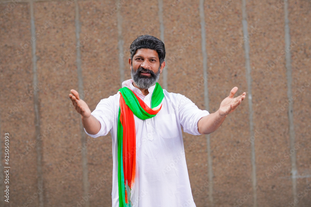 Indian man in traditional wear and giving expression. Stock Photo ...