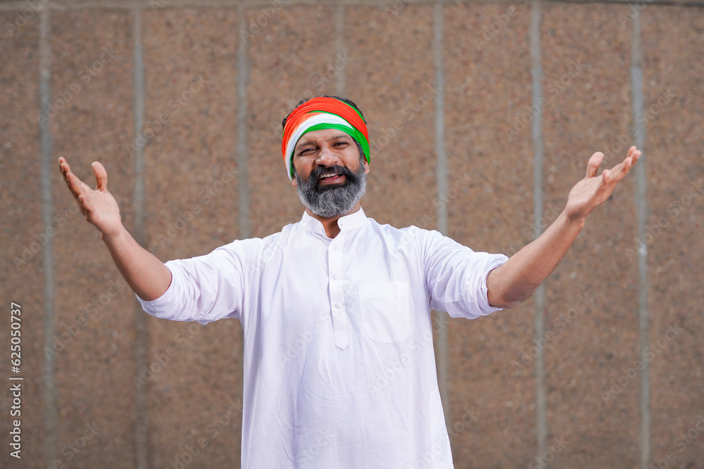 Indian man in traditional wear and giving expression. Stock Photo ...
