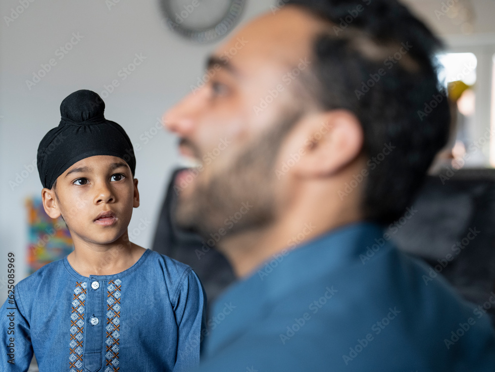 Father and son in traditional clothing Stock Photo | Adobe Stock