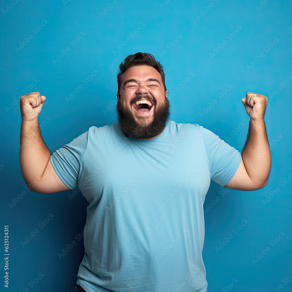Excited fat man celebrating success. Happy plus size bearded man on ...