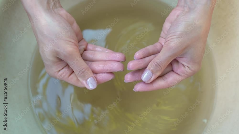 Demonstration female hands with wrinkles after bath. Woman showing her ...