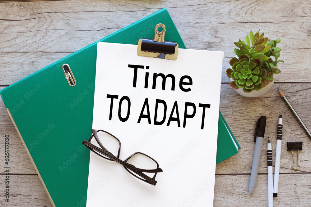 TIME FOR ADAPT. a4 paper. text on white page on folder Stock Photo ...