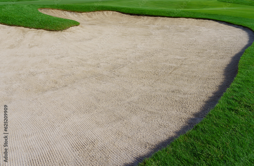 Golf Course Sand Pit Bunkers, green grass surrounding the beautiful ...