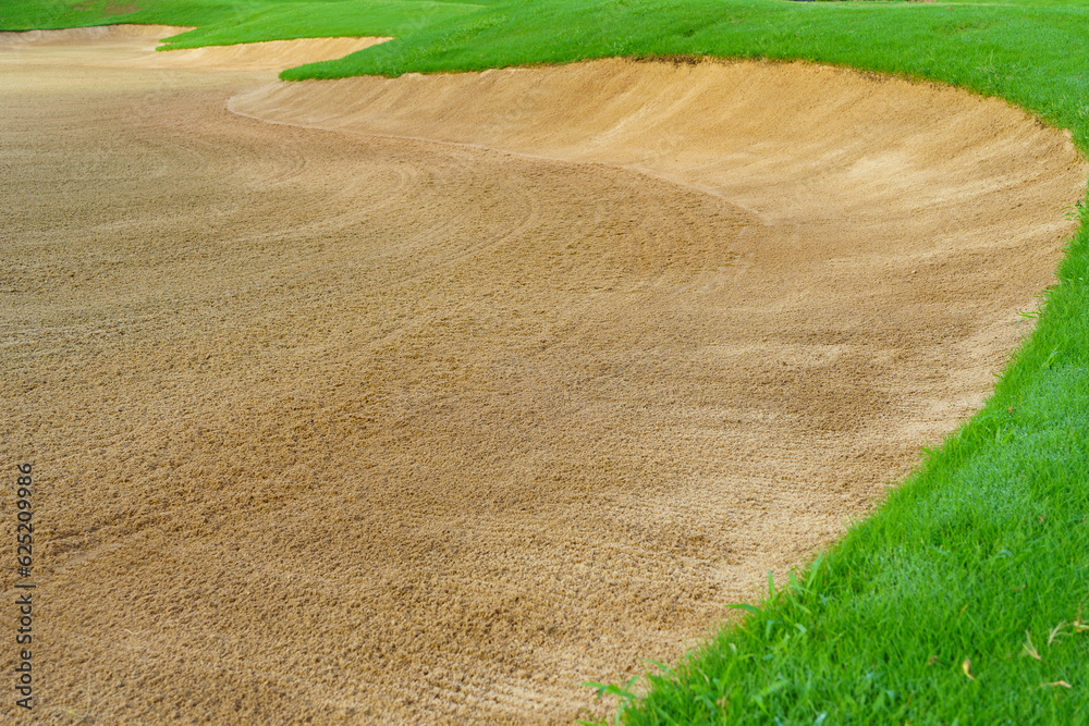 Golf Course Sand Pit Bunkers, green grass surrounding the beautiful ...