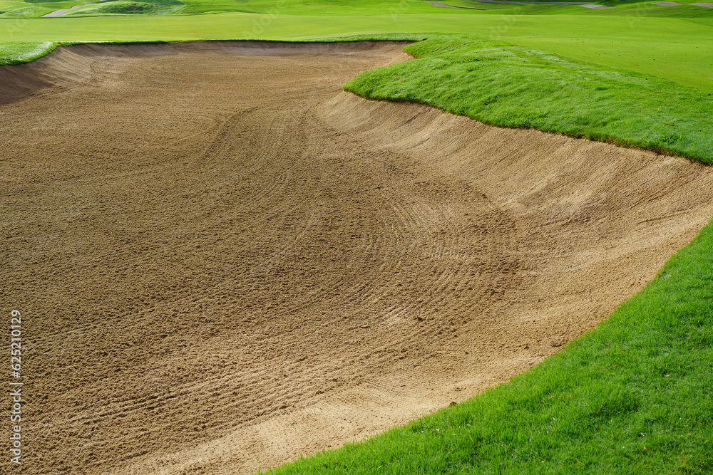 Golf Course Sand Pit Bunkers, green grass surrounding the beautiful ...