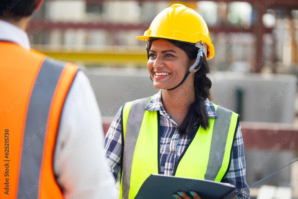 Asian indian woman engineering worker shaking hands on business ...