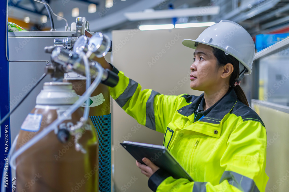 Asian engineer working at Operating hall,Thailand people wear helmet ...