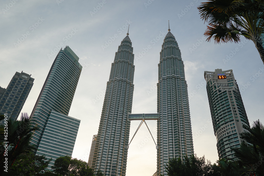 KUALA LUMPUR, MALAYSIA - MAY 28, 2023: street level view of Petronas ...