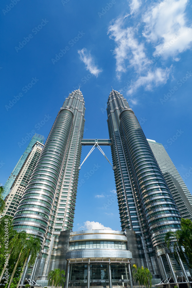 KUALA LUMPUR, MALAYSIA - MAY 29, 2023: street level view of Petronas ...