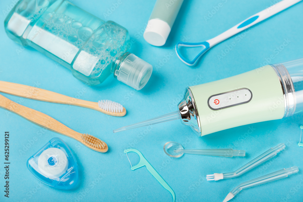 Electronic oral irrigator, toothbrush, paste, dental floss and ...