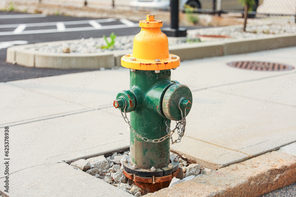 Vibrant urban symbol, fire hydrant on street embodies safety, readiness ...