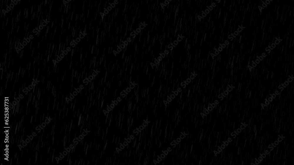 Heavy rain wall falling in front of the camera against black screen ...