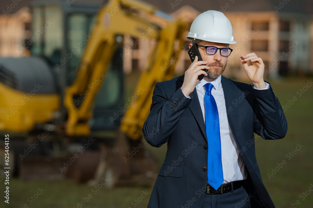 Civil engineer worker at a construction site. Mature engineer worker ...