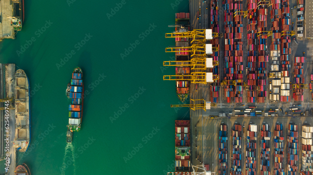 commercial port loading and unloading cargo from container ship import ...