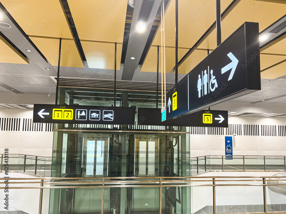 MRT hall sign with information about the directions to the different ...