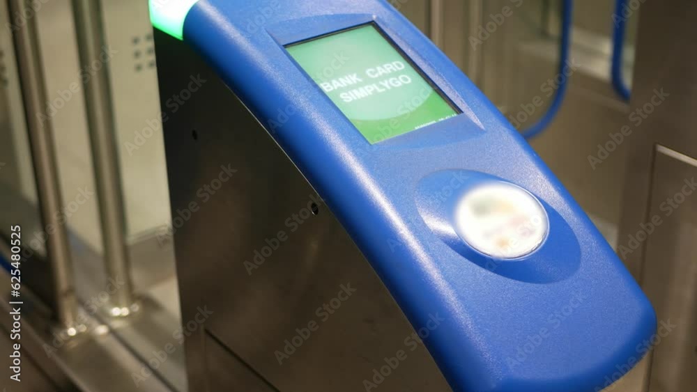 view to contactless emv card reader at the exit door on the bus public ...