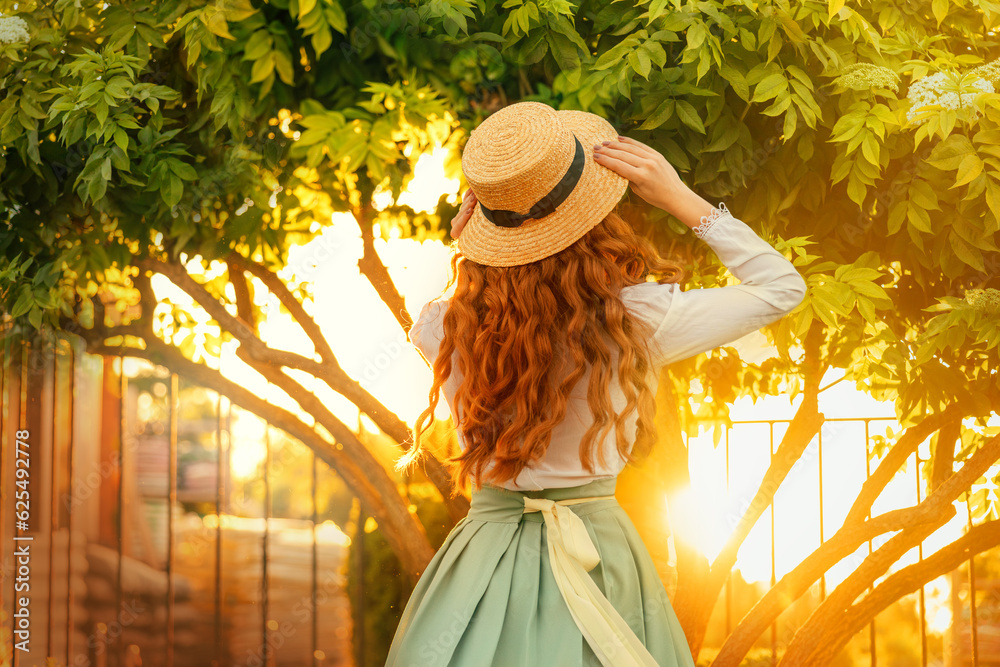 happy woman dancing spinning in vintage straw hat, girl long curly red ...
