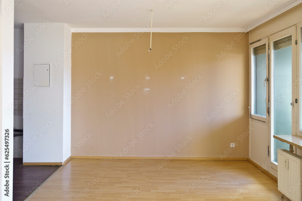 Unrenovated room in a 1970s apartment with the original and outdated ...