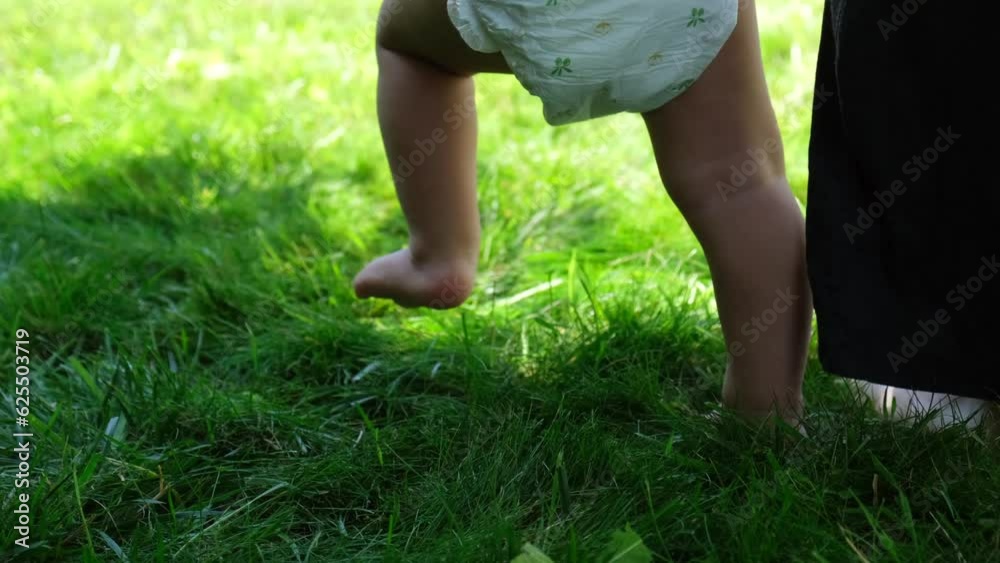 the child takes the first steps in learning. happy family childhood ...