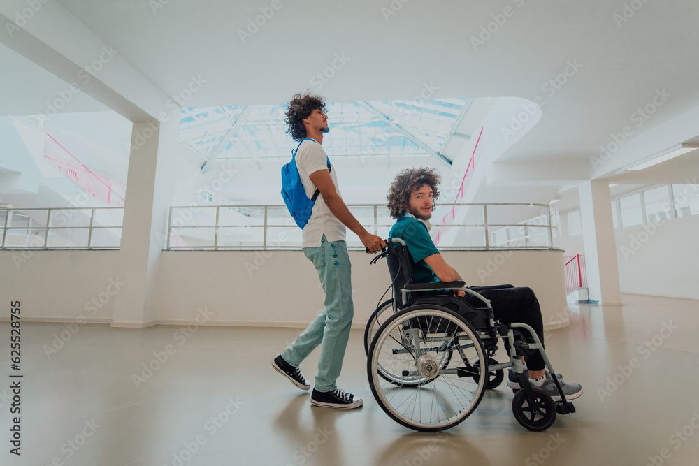 African American student pushing his friend's wheelchair through a ...