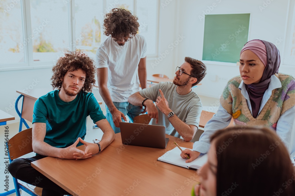 A diverse group of students gathers in a modern school classroom ...