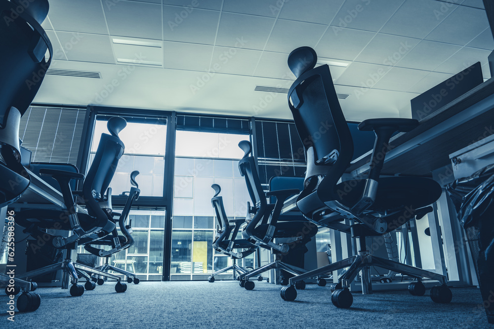 Empty office. Empty positions in the corporate building. Cool colors of ...