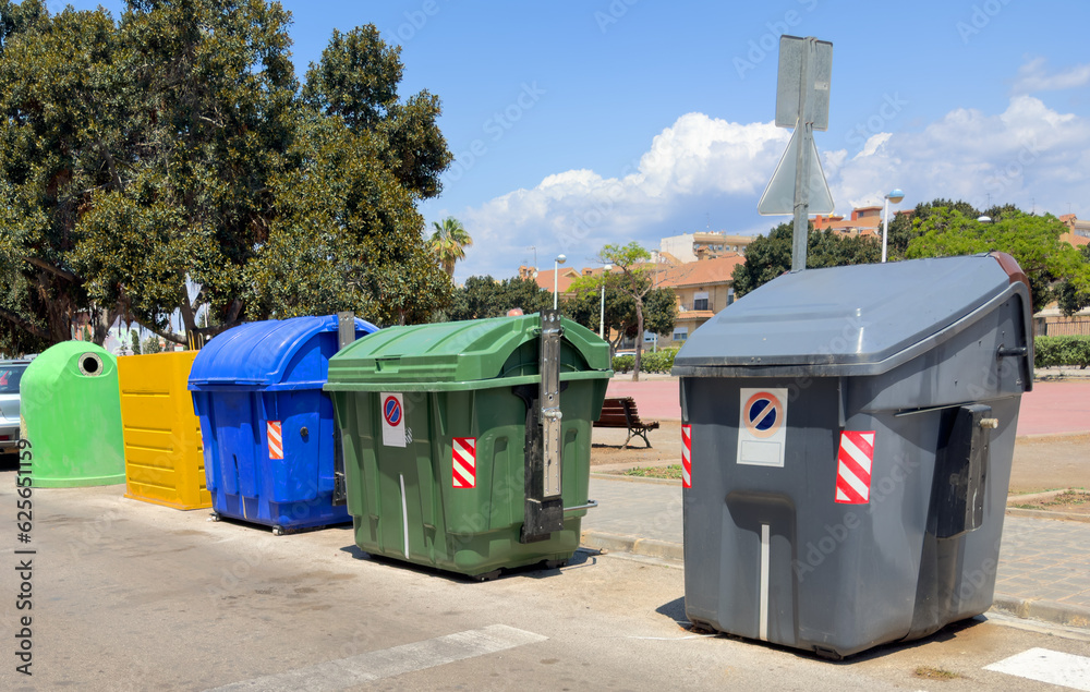 Dumpster for Garbage and food waste on city Spain street. Plastic bags ...