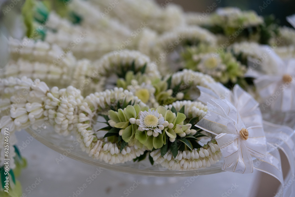 Flower garland for bride and groom in Thai wedding. Thai called Phuang ...
