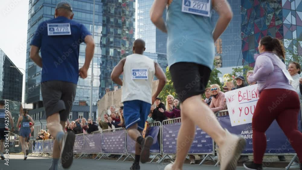 Back View: Diverse Group of Marathon Joggers Competing for the First ...