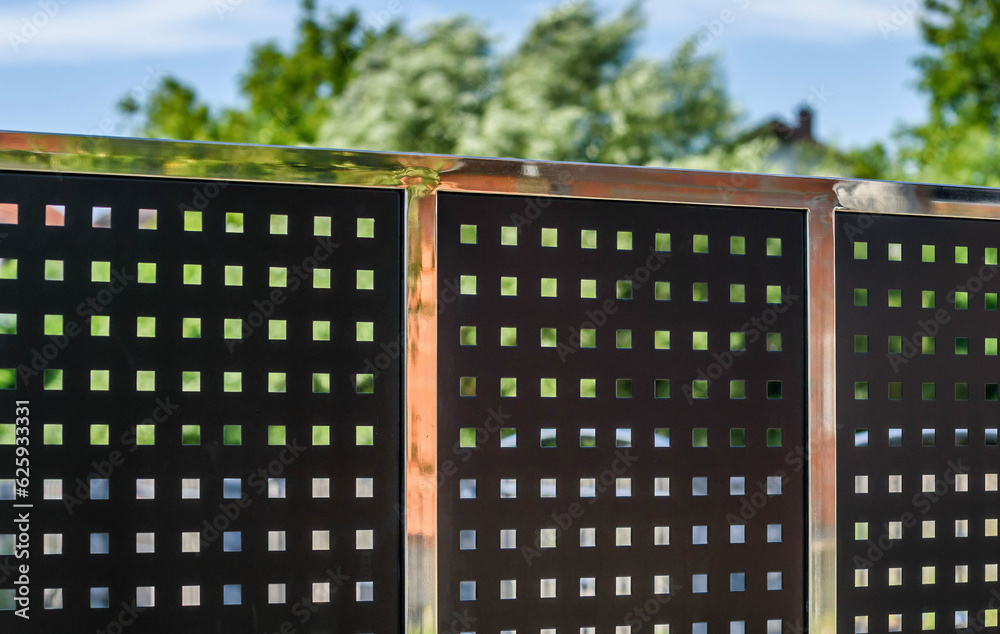 A Modern Take on Perforated Metal Fencing Stock Photo | Adobe Stock