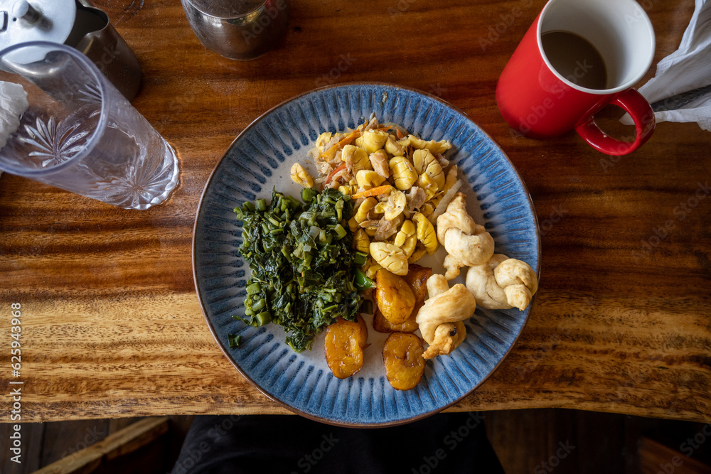 A Jamaican breakfast of ackee & saltfish, sweet plantains, callaloo ...