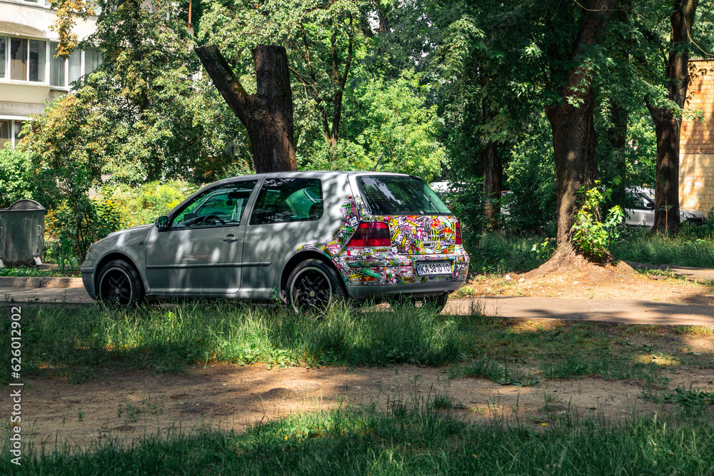 Volkswagen Golf MK4 with stickers pasted on the rear bumper and trunk ...